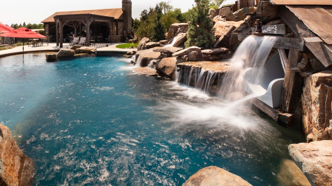 Lagoon-Style Pool Features - Luxury Pools + Outdoor Living