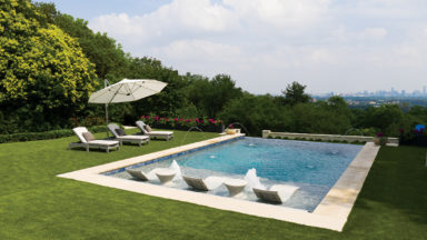 The Benefits of Adding a Tanning Ledge to Your Pool - Luxury Pools ...