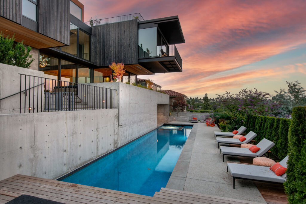 Eco-Friendly Hillside Pool Design by KrisCo - Luxury Pools + Outdoor Living