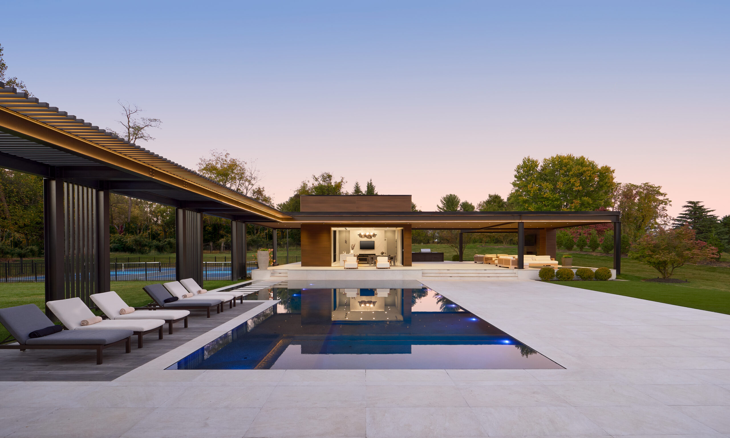 Modern Meets Farmhouse: A Poolhouse That Anchors a Serene Outdoor Retreat